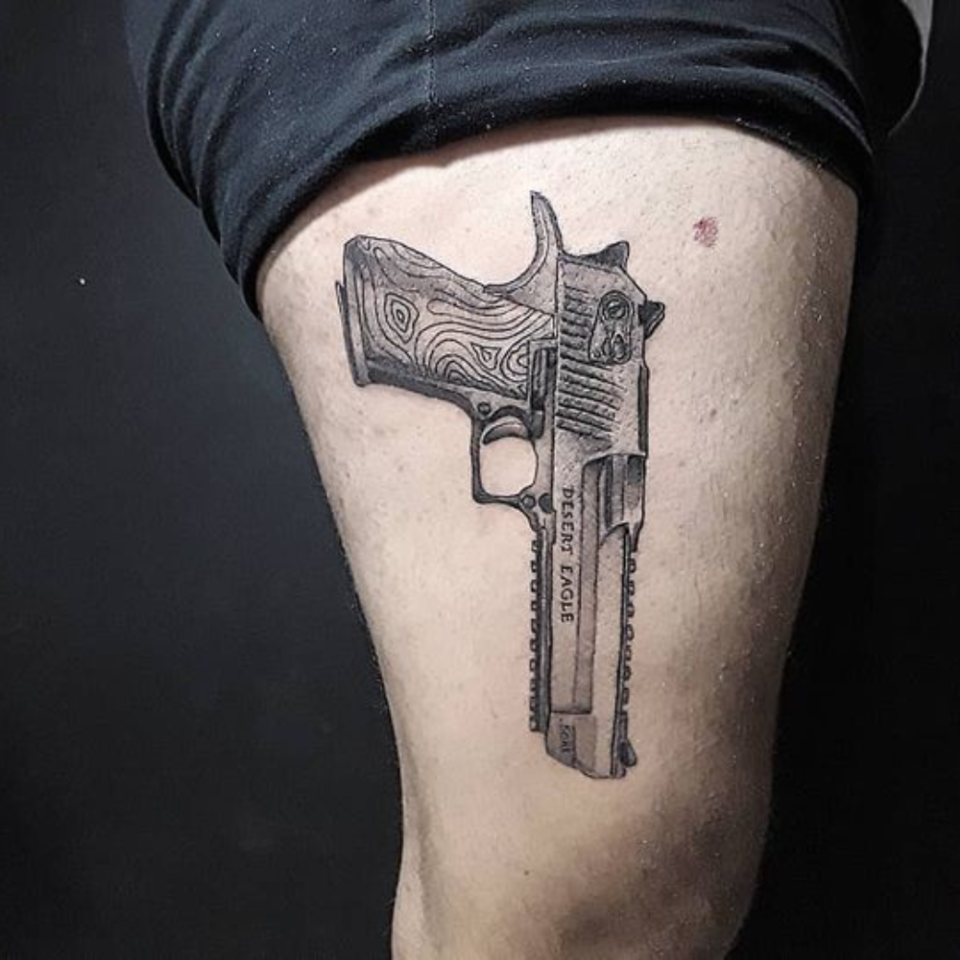 Engraved Revolver Tattoo