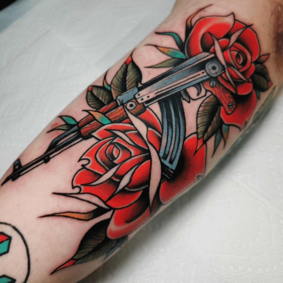 Gun Tattoos With Roses
