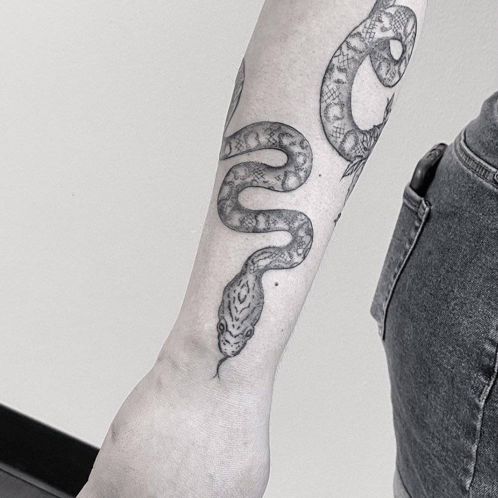What Does A Snake Tattoo Mean? – Best men's cologne – buying guide